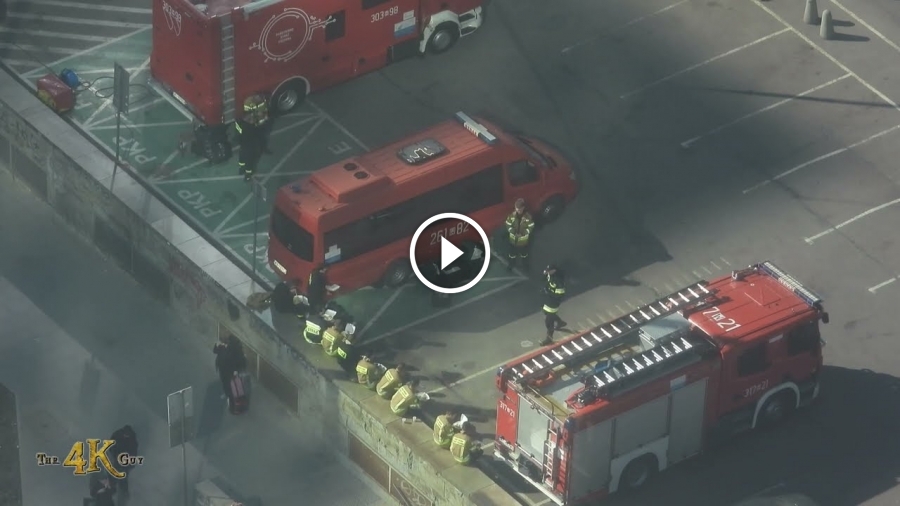 Warsaw: Firemen take a well disserved lunch break after helping woman ...