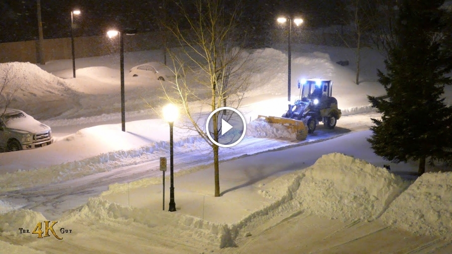 Snowplow video 9 - John Deere loader plowing condo driveway during ...